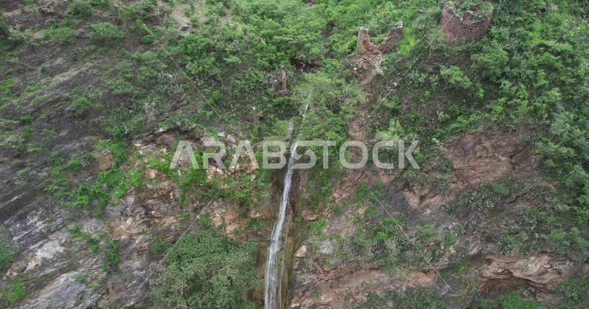 The beauty of nature and waterfalls in the Rijal Alma Mountains in Asir ...
