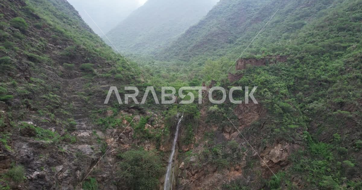 The beauty of nature and waterfalls in the Rijal Alma Mountains in Asir ...