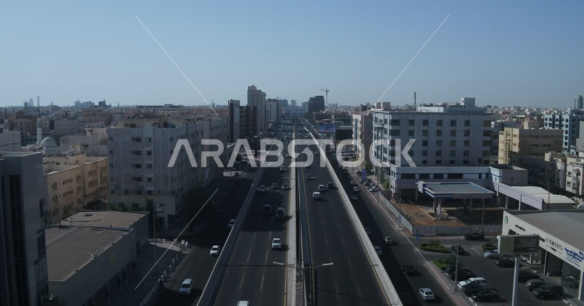 Drone photography from above of car traffic on the city road in Jeddah ...
