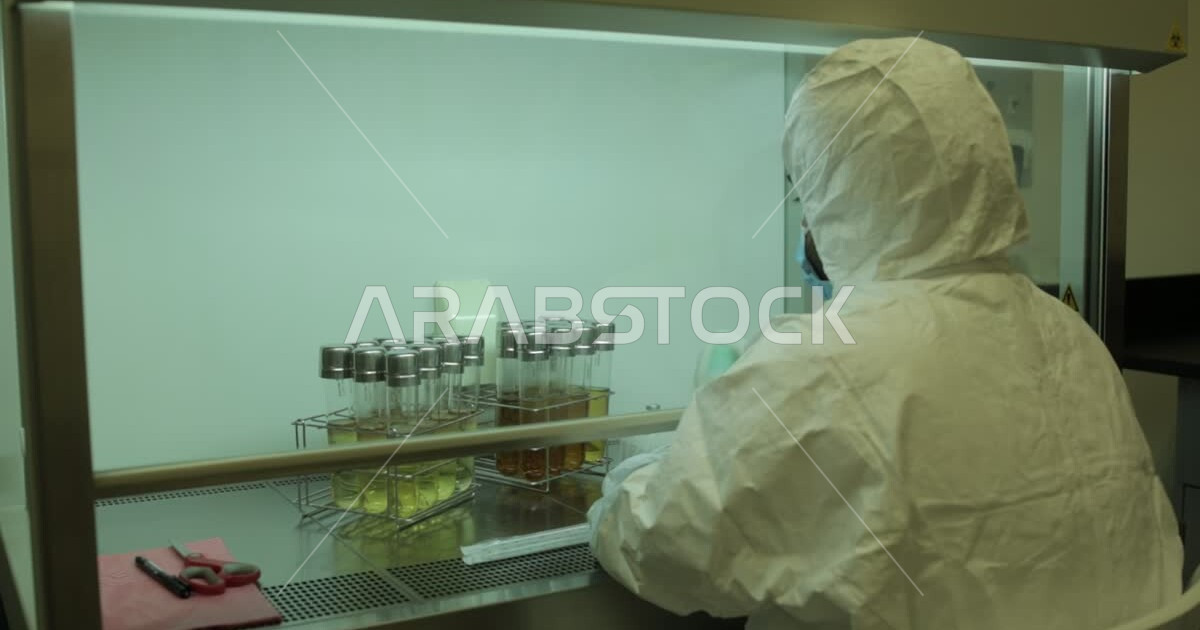 Saudi laboratory man, performing laboratory tests inside the laboratory ...