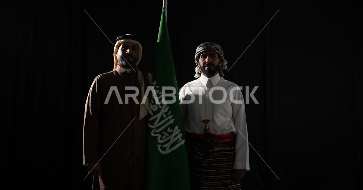 Portrait of two Saudi Arabian Gulf men wearing traditional Saudi ...