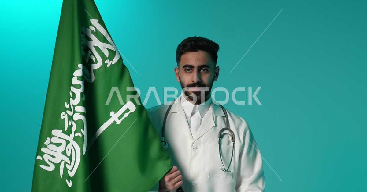 A Saudi Gulf Arab doctor wearing a medical coat and working in the ...