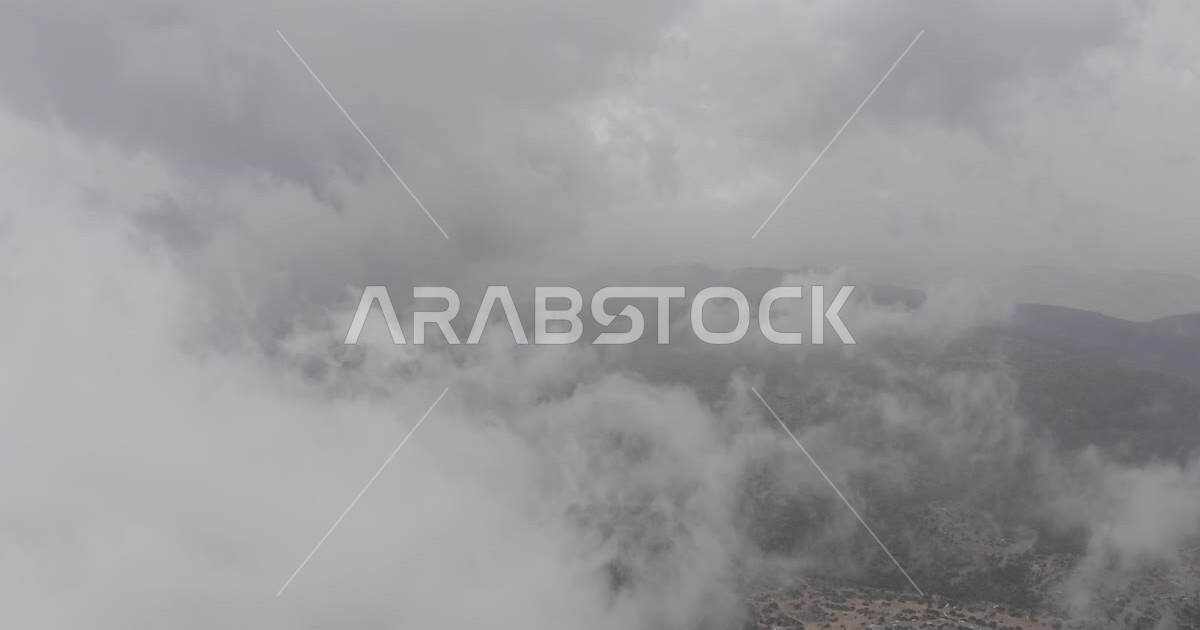 Drone photography of the movement of fog and clouds over the charming ...