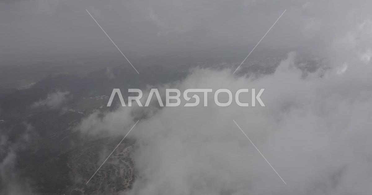 Drone photography of the movement of fog and clouds over the charming ...