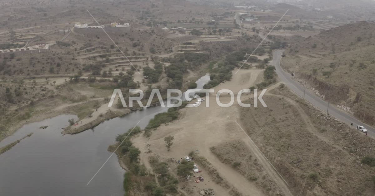 Drone photography of the Daboei Dam lake in the Al-Soudah region of ...