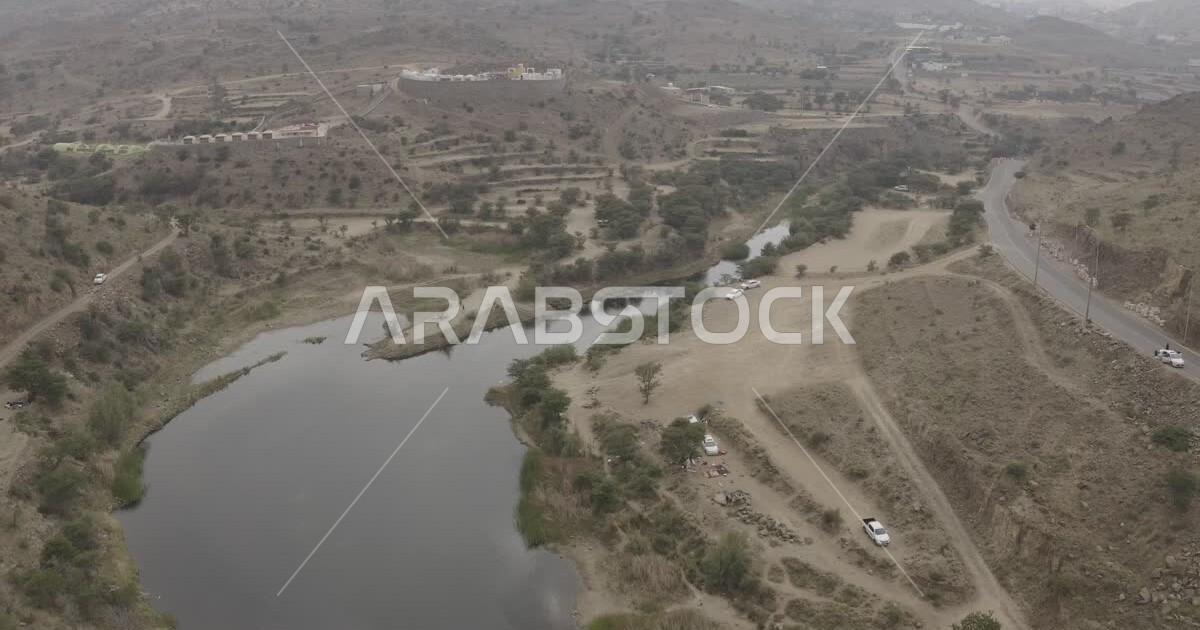 Drone photography of the Daboei Dam lake in the Al-Soudah region of ...