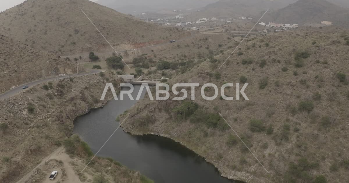 Drone photography of the Daboei Dam lake in the Al-Soudah region of ...