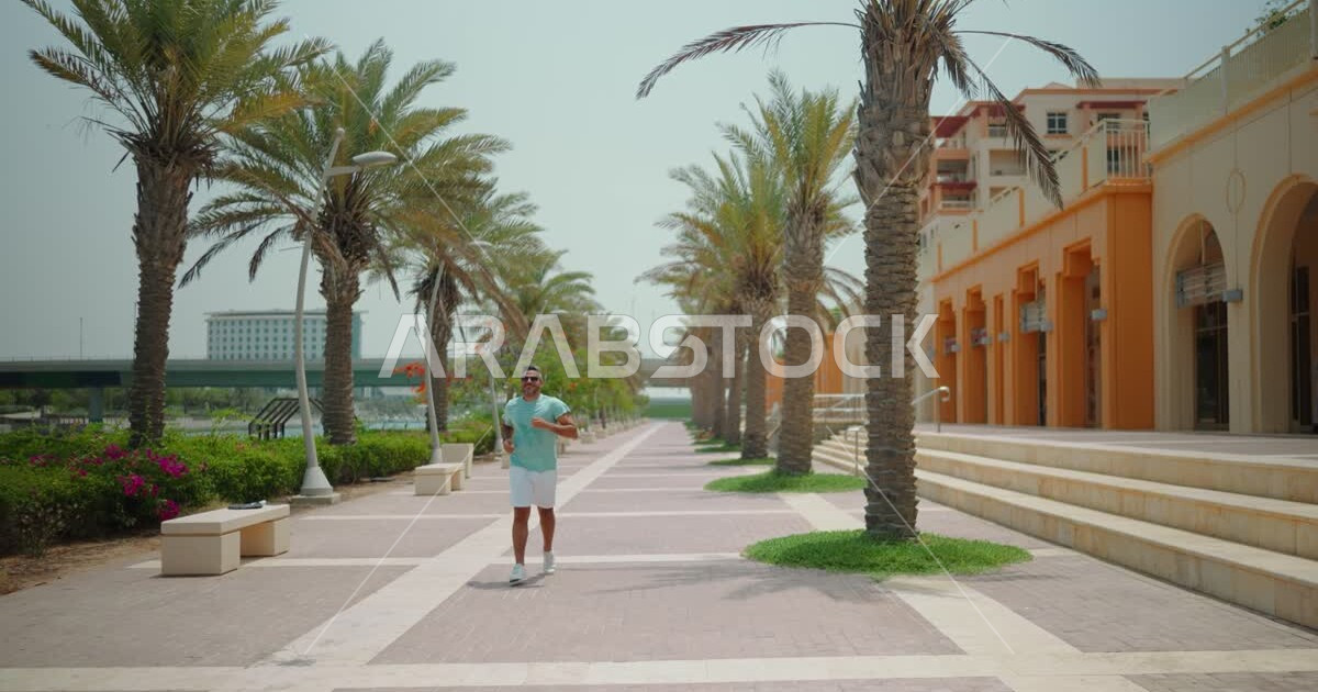 A Saudi Arabian Gulf man practicing morning sports on the Jeddah ...