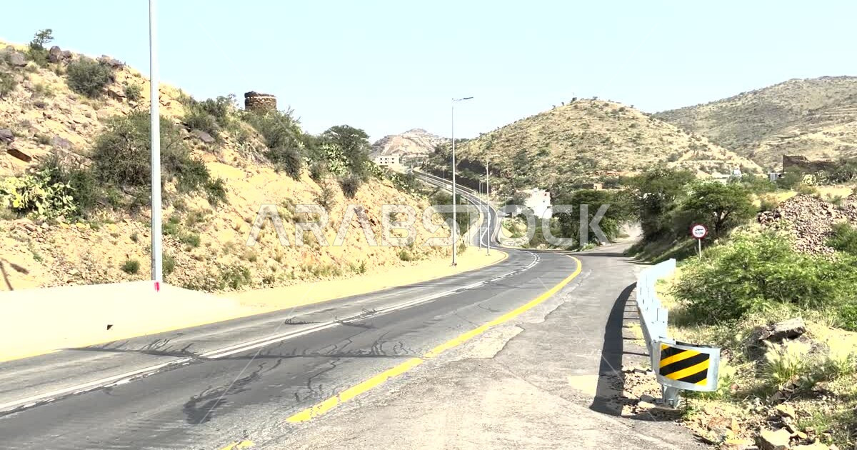 An asphalt road in the middle of the Al-Soudah Mountains in Abha, Saudi ...