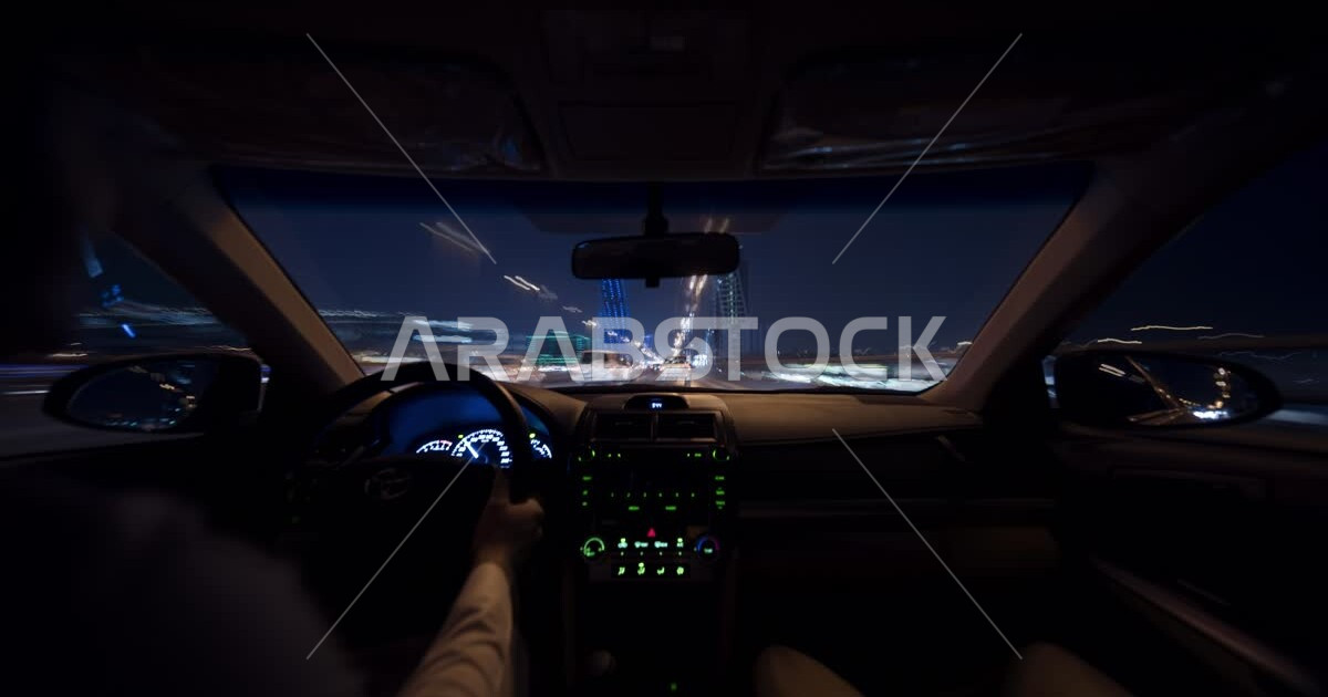 Time lapses for a Saudi Arabian Gulf man driving the car, traffic ...
