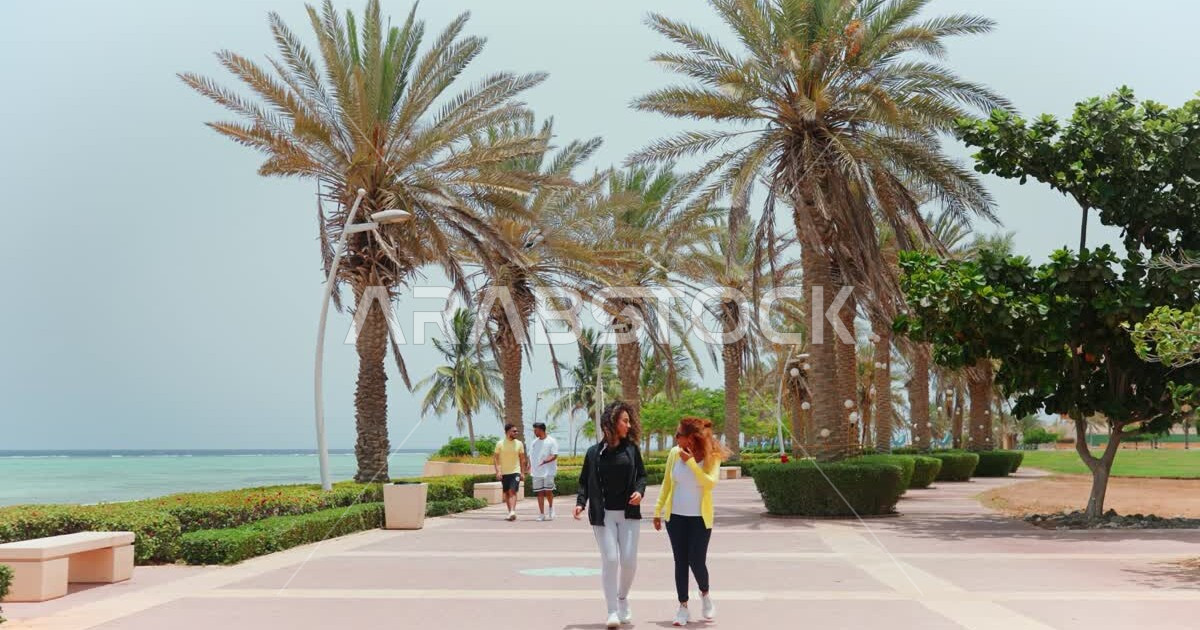 A group of Saudi Arab Gulf friends practicing walking, health and ...