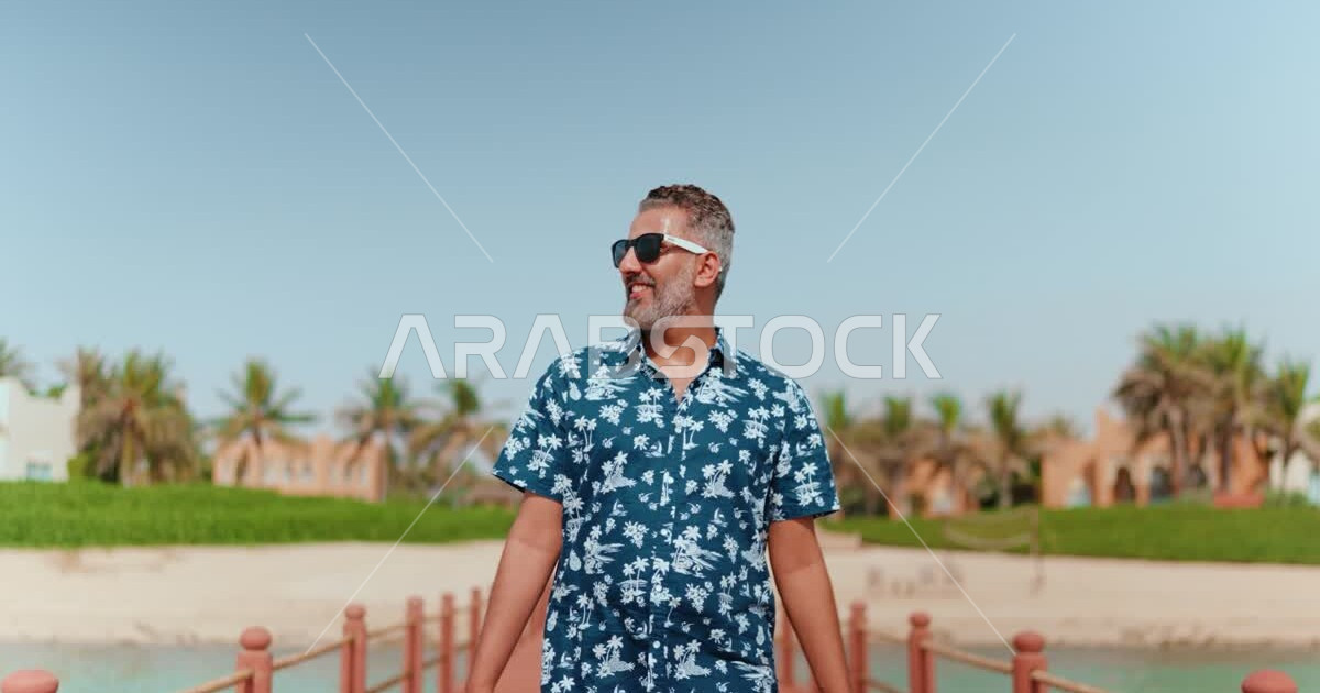 A Saudi Arabian Gulf man on a fun summer trip, summer vacation ...