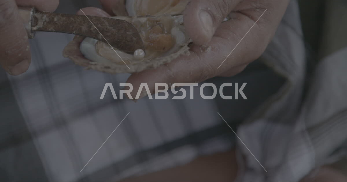 The craft of extracting pearls from inside oyster shells, an ancient ...