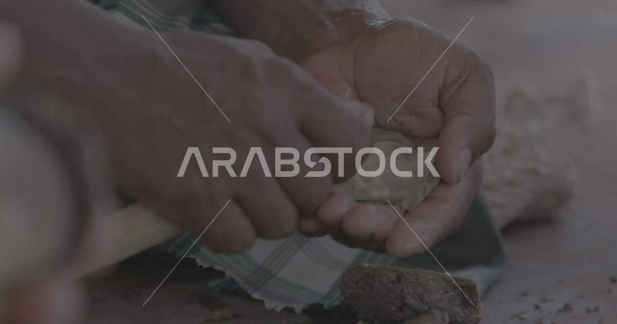 The craft of extracting pearls from inside oyster shells, an ancient ...
