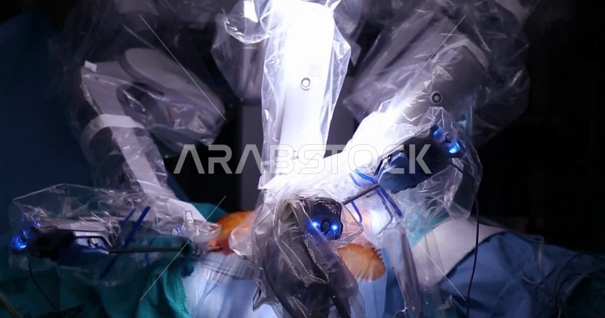 robot performing a medical surgery, controlling the robot remotely ...