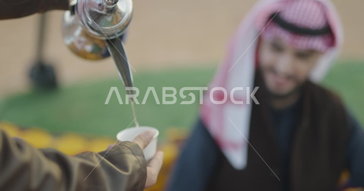 A group of Saudi Gulf Arab friends enjoying a road trip in the Saudi ...