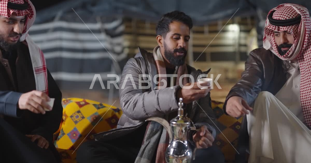 A group of Saudi Gulf Arab friends enjoying a road trip in the Saudi ...