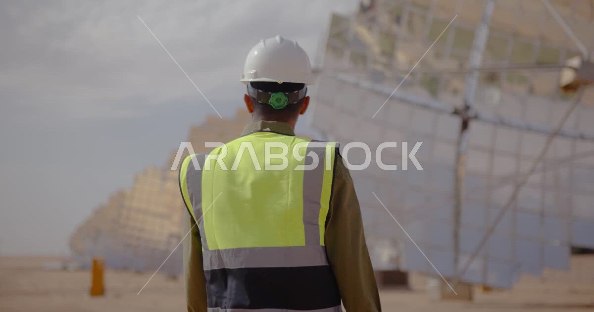 Saudi Arabian Gulf energy engineer supervising solar power plants in ...