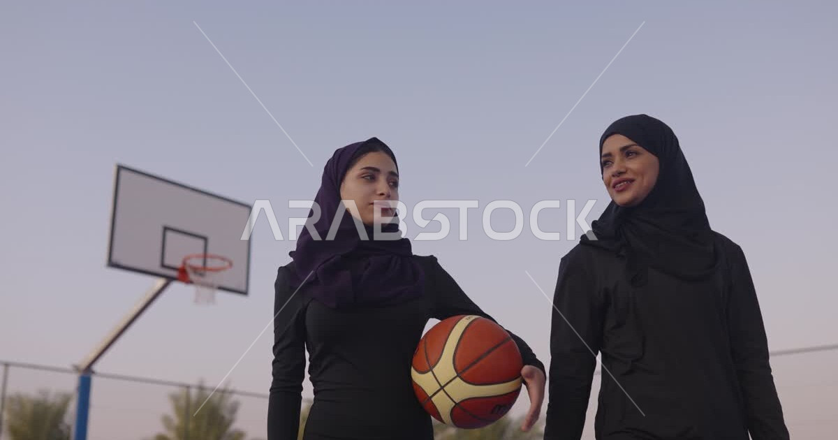 Hyper labs for two Saudi Arab Gulf women playing basketball, practicing ...