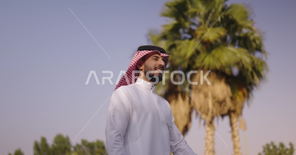 A Saudi Arab Gulf man in the open air, outdoor home garden, tourist ...