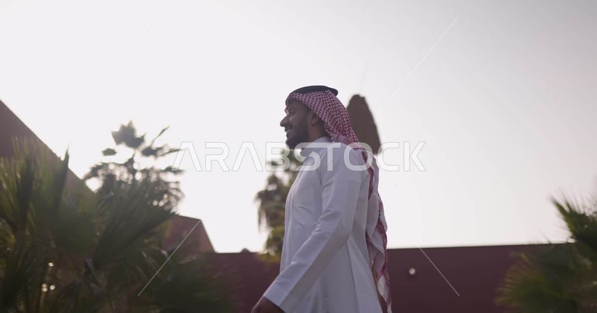 A Saudi Arab Gulf man in the open air, outdoor home garden, tourist ...