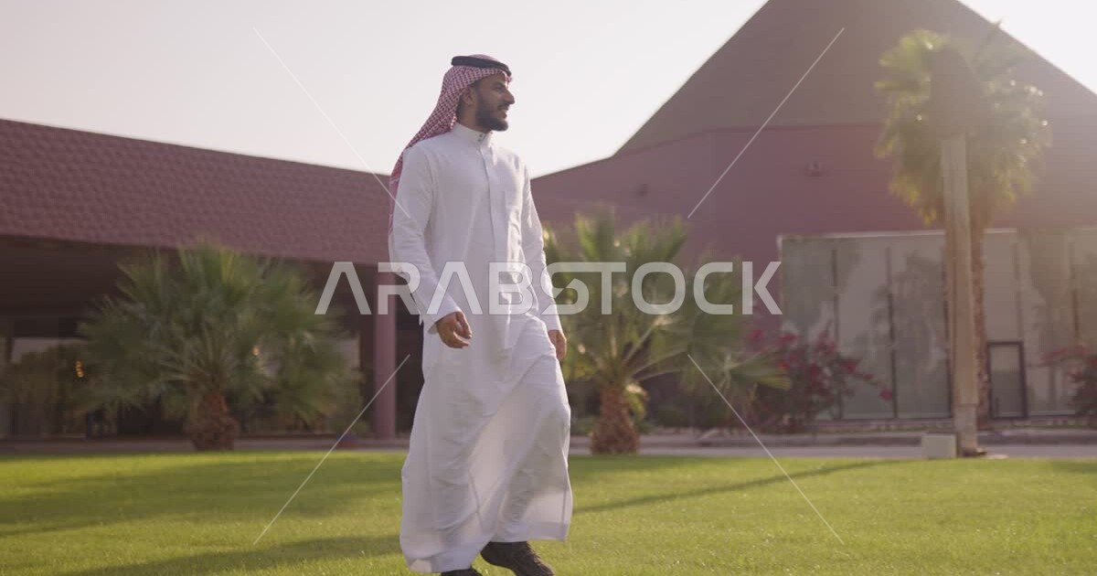A Saudi Arab Gulf man in the open air, outdoor home garden, tourist ...