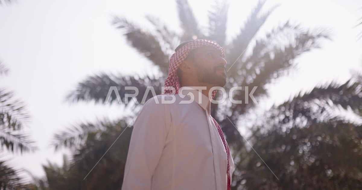 A Saudi Arabian Gulf man in one of the desert natural areas in the ...