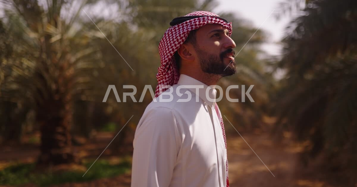 A Saudi Arabian Gulf man in one of the desert natural areas in the ...