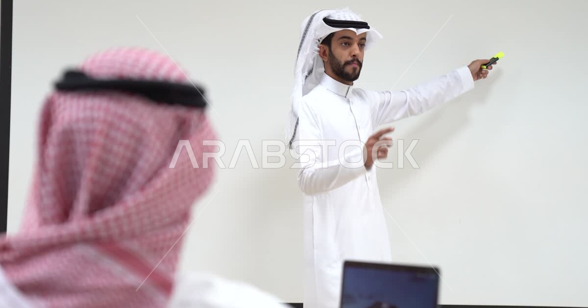 A Saudi Arabian Gulf university professor explains to his students the ...