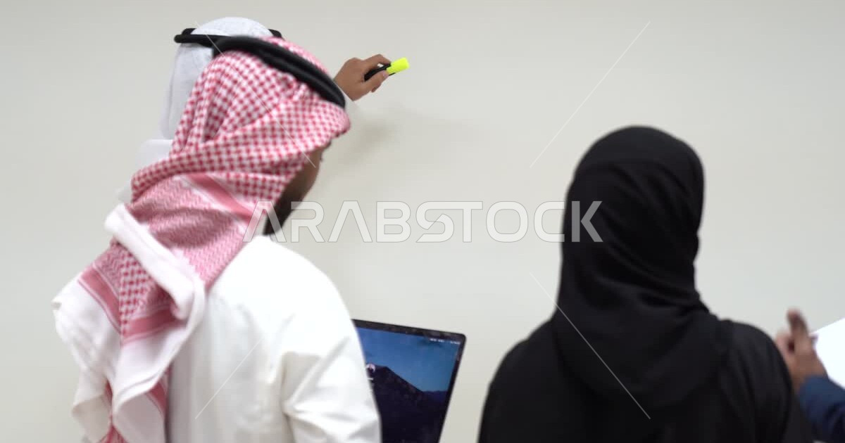 A Saudi Arabian Gulf university professor explains to his students the ...