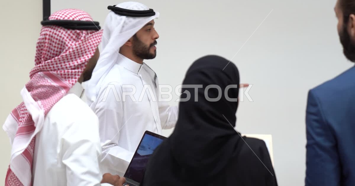 A Saudi Arabian Gulf university professor explains to his students the ...