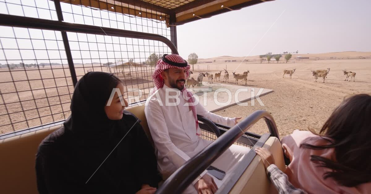 A Saudi Gulf Arab family on a tourist tour, spending fun family times ...