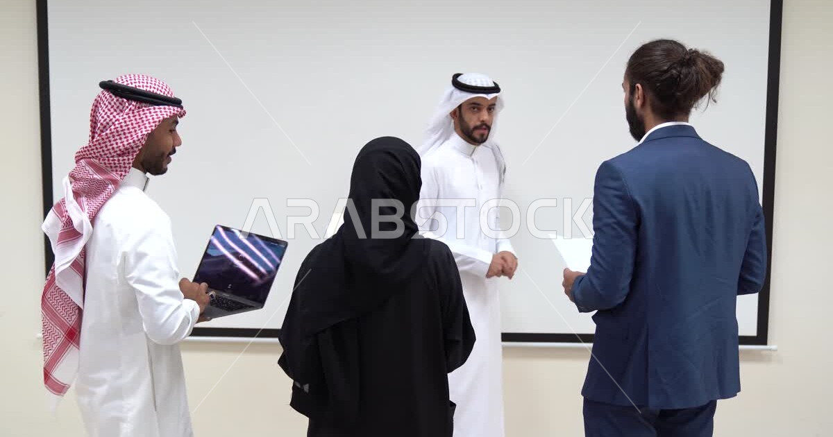 A Saudi Arabian Gulf university professor explains to his students the ...
