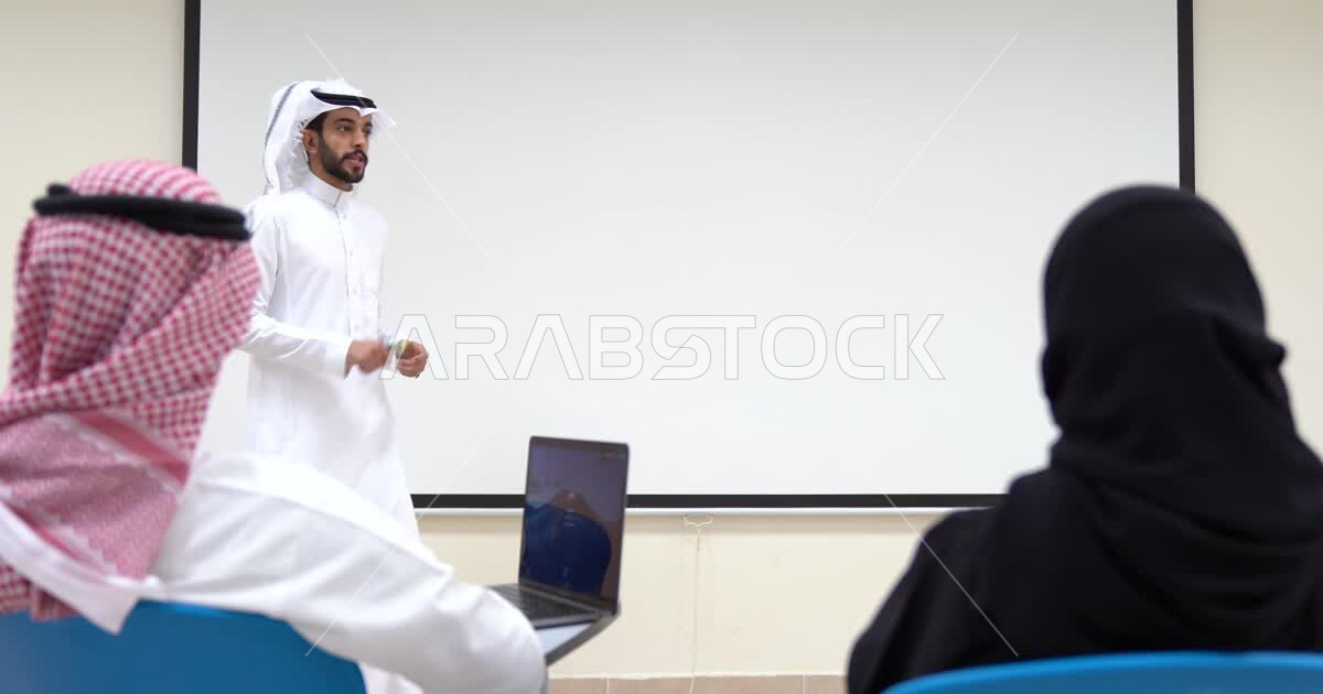 A Saudi Arabian Gulf university professor explains to his students the ...