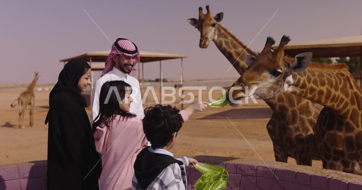 A Saudi Gulf Arab family spends fun times in the zoo in the Kingdom of ...
