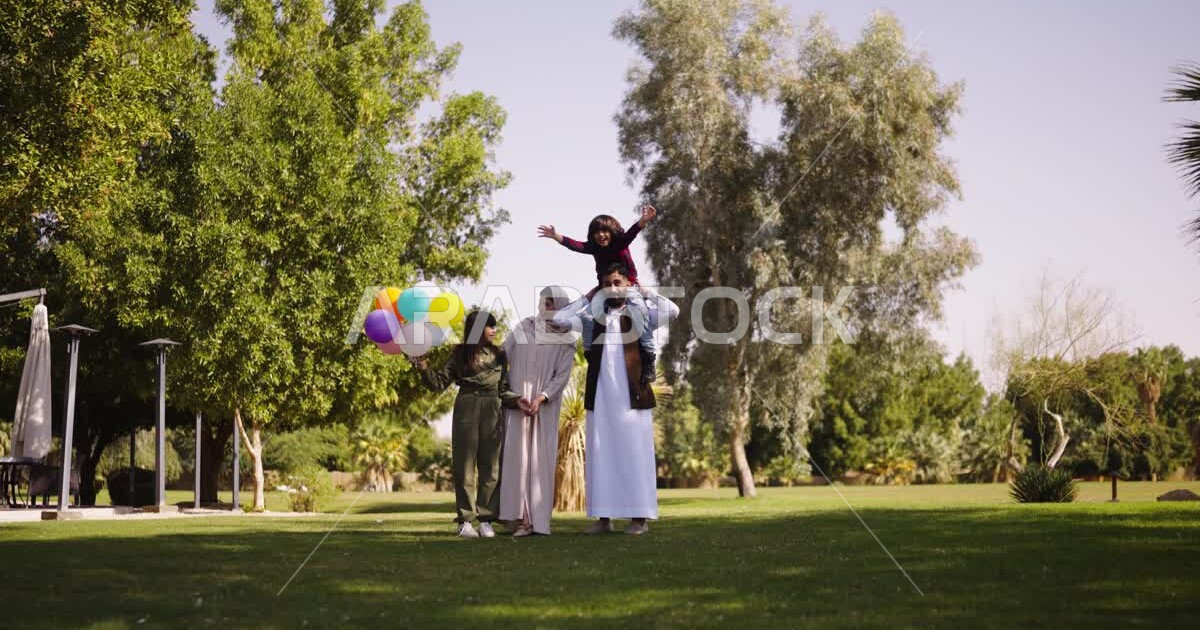 A Saudi Arabian Gulf family spends fun times in a park in Saudi Arabia ...