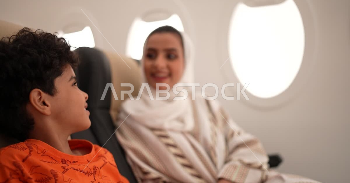 A Saudi Gulf Arab family inside the plane, family trips, airlines ...
