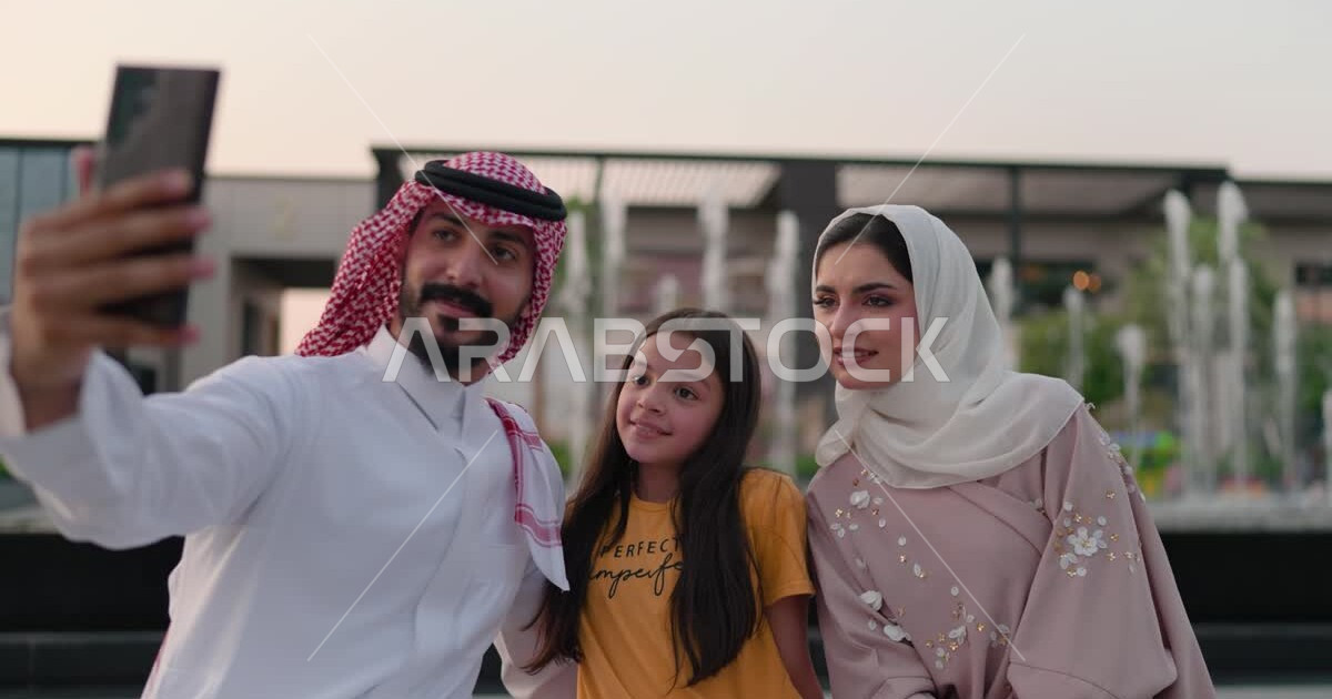 A Saudi Arabian Gulf family strolling in The Zone lobby complex in ...