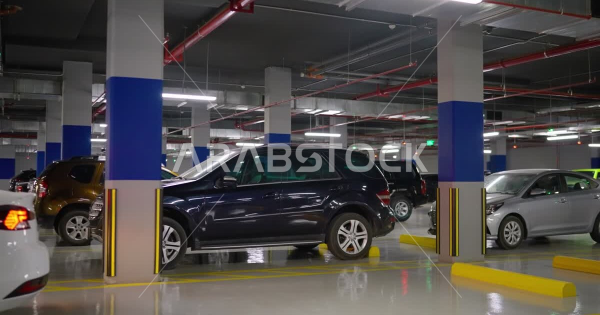 A Saudi Arabian Gulf man parks the car in the parking lot of The Zone ...