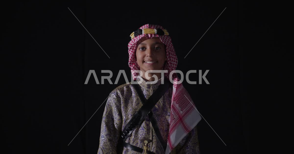 Chroma, a Saudi Arabian Gulf boy, wearing the traditional Saudi folk ...