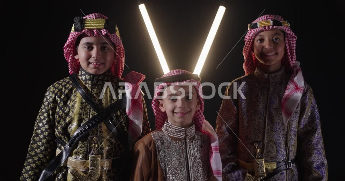 Chroma, a group of Saudi Arab boys, wearing the traditional Saudi folk ...