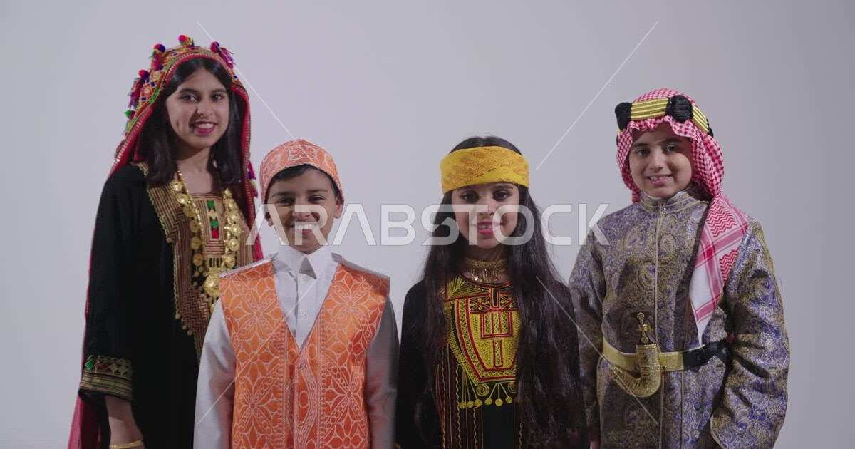 Chroma, a group of Saudi Arab children, wearing the traditional Saudi ...
