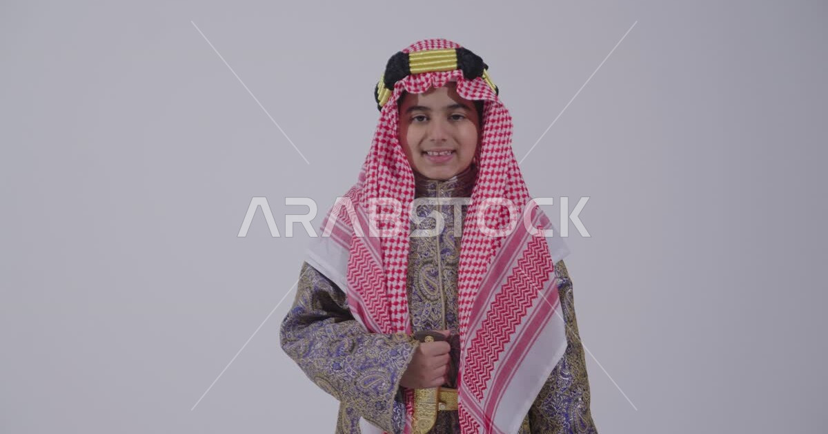 Chroma, a Saudi Arabian Gulf boy, wearing the traditional Saudi folk ...