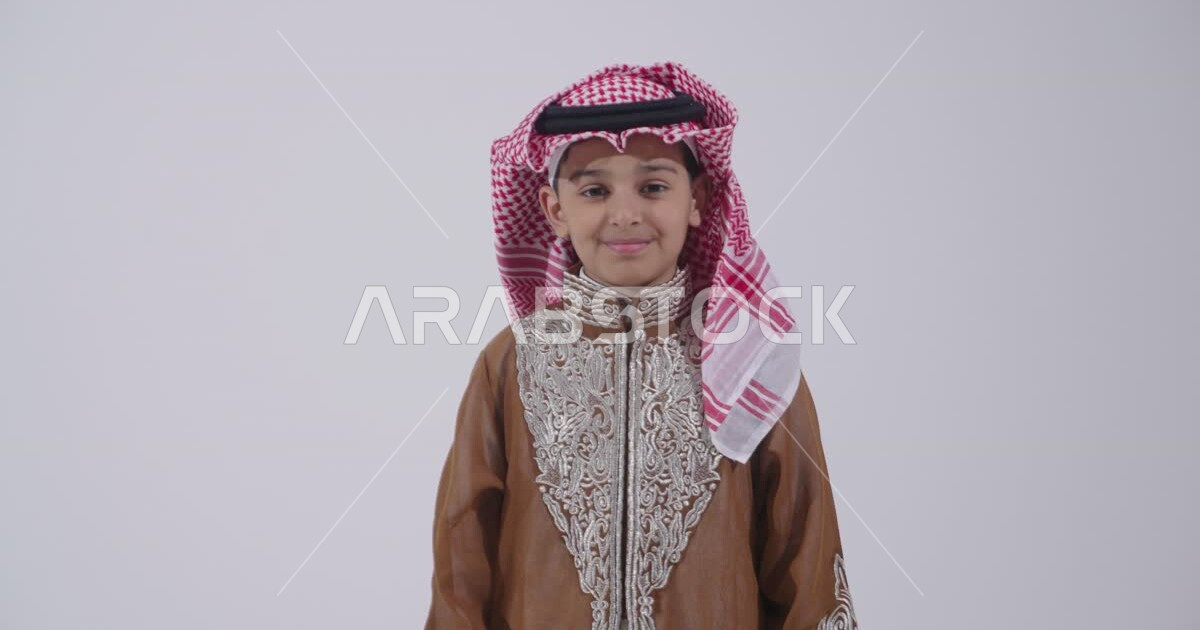 Chroma, a Saudi Arab Gulf boy, wearing the traditional Saudi folk ...