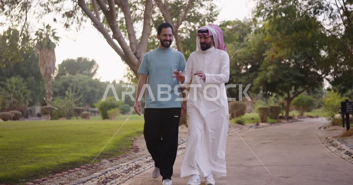 Two Saudi Arabian Gulf friends touring in one of the entertainment ...