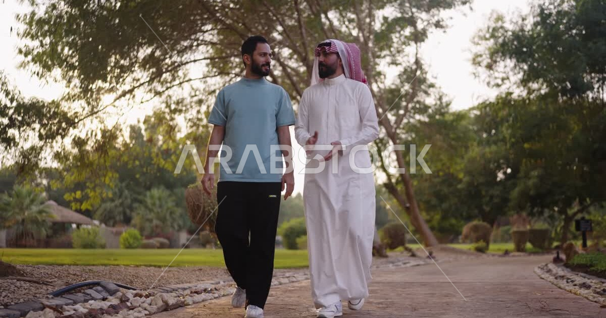 Two Saudi Arabian Gulf friends touring in one of the entertainment ...