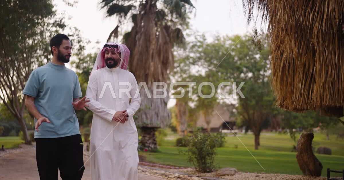 Two Saudi Arabian Gulf friends touring in one of the entertainment ...