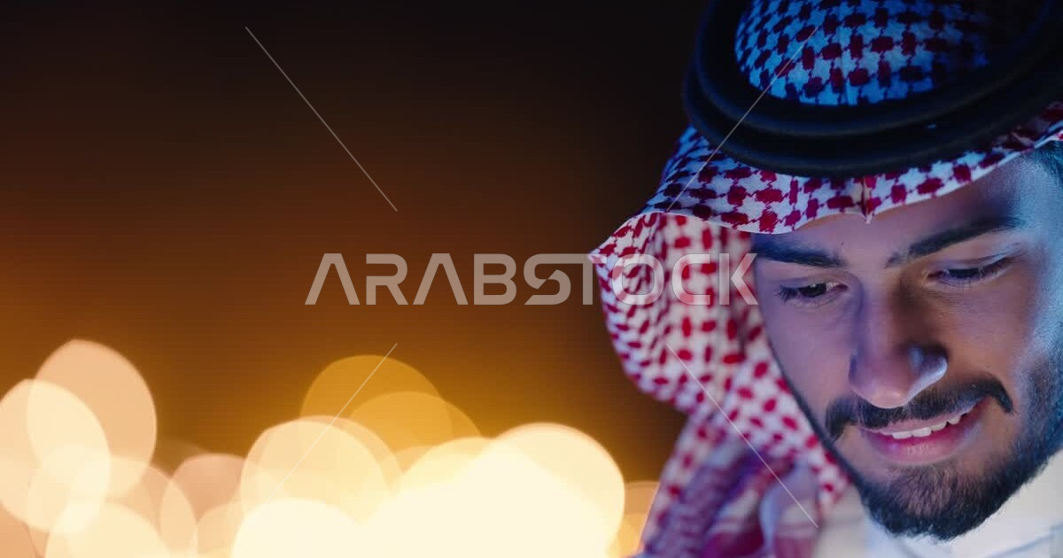 Close-up of a Saudi Arabian Gulf man wearing traditional Saudi dress ...