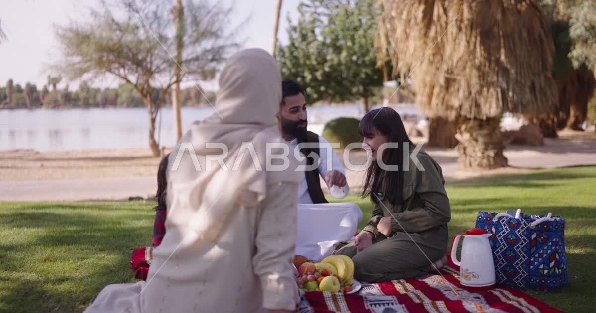 A Saudi Gulf Arab family spends fun times in a public park in Saudi ...
