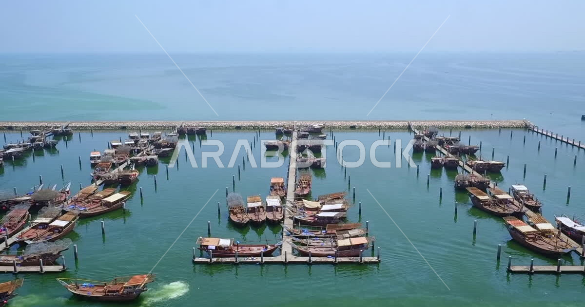 The waterfront of the Dammam Sea Corniche, sailboats on the Dammam ...